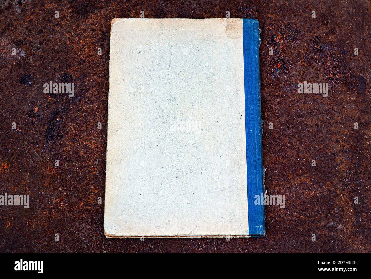 Old Book on the Rusty Metal Background closeup Stock Photo - Alamy