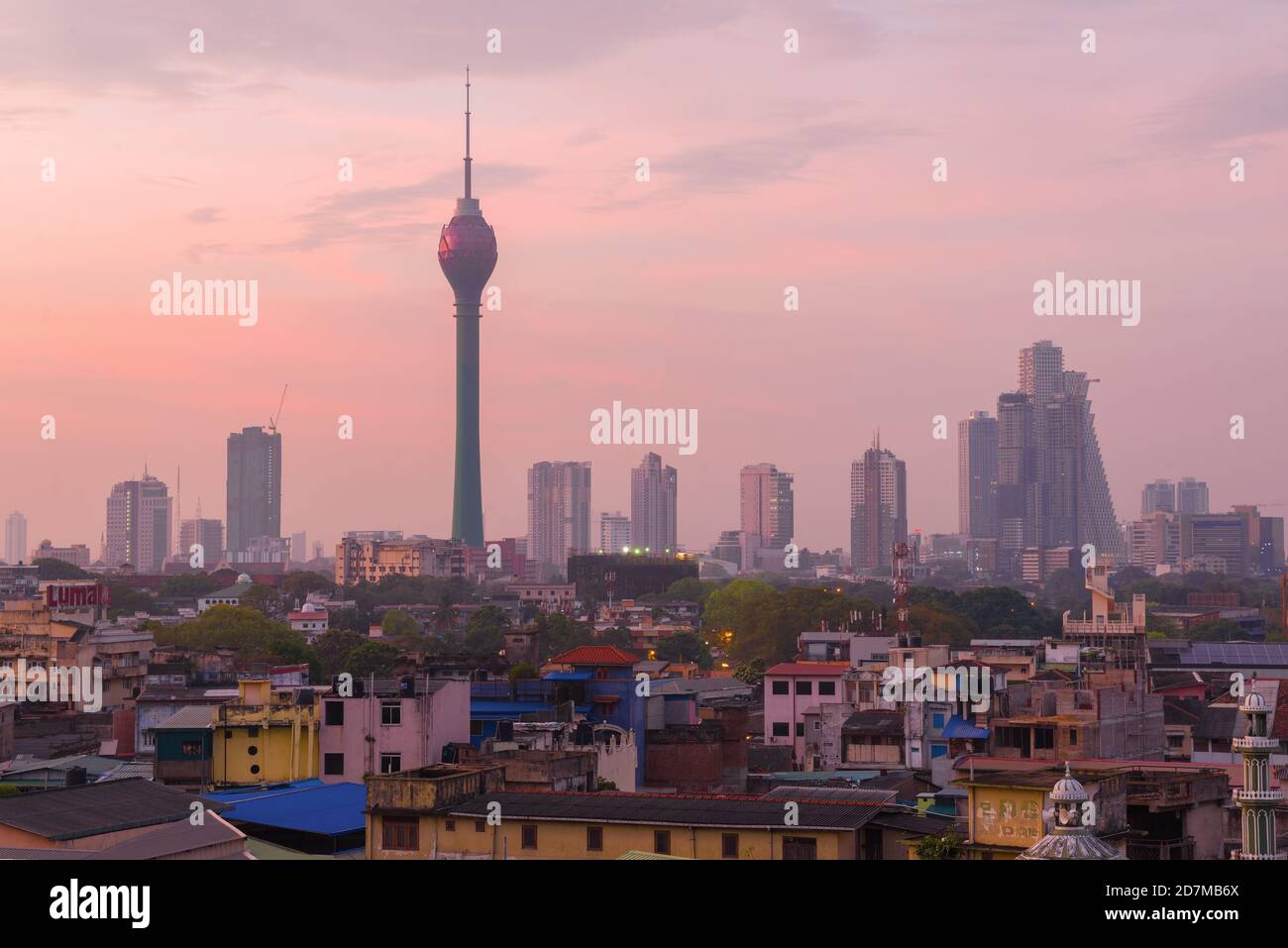 COLOMBO, SRI LANKA - FEBRUARY 22, 2020: Pink sunrise over modern ...