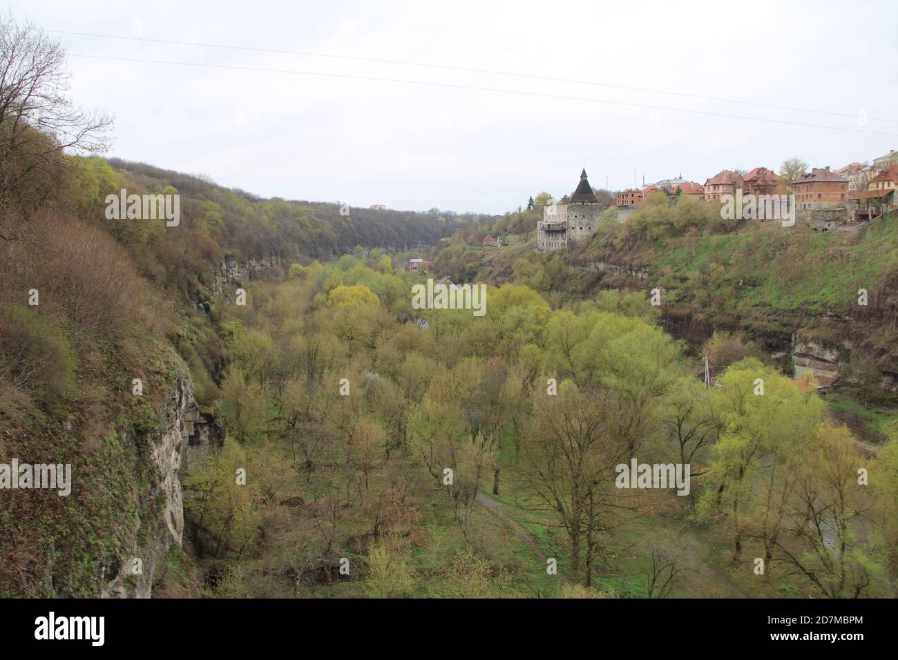 a village in a dry riverbed from the bridge Stock Photo - Alamy