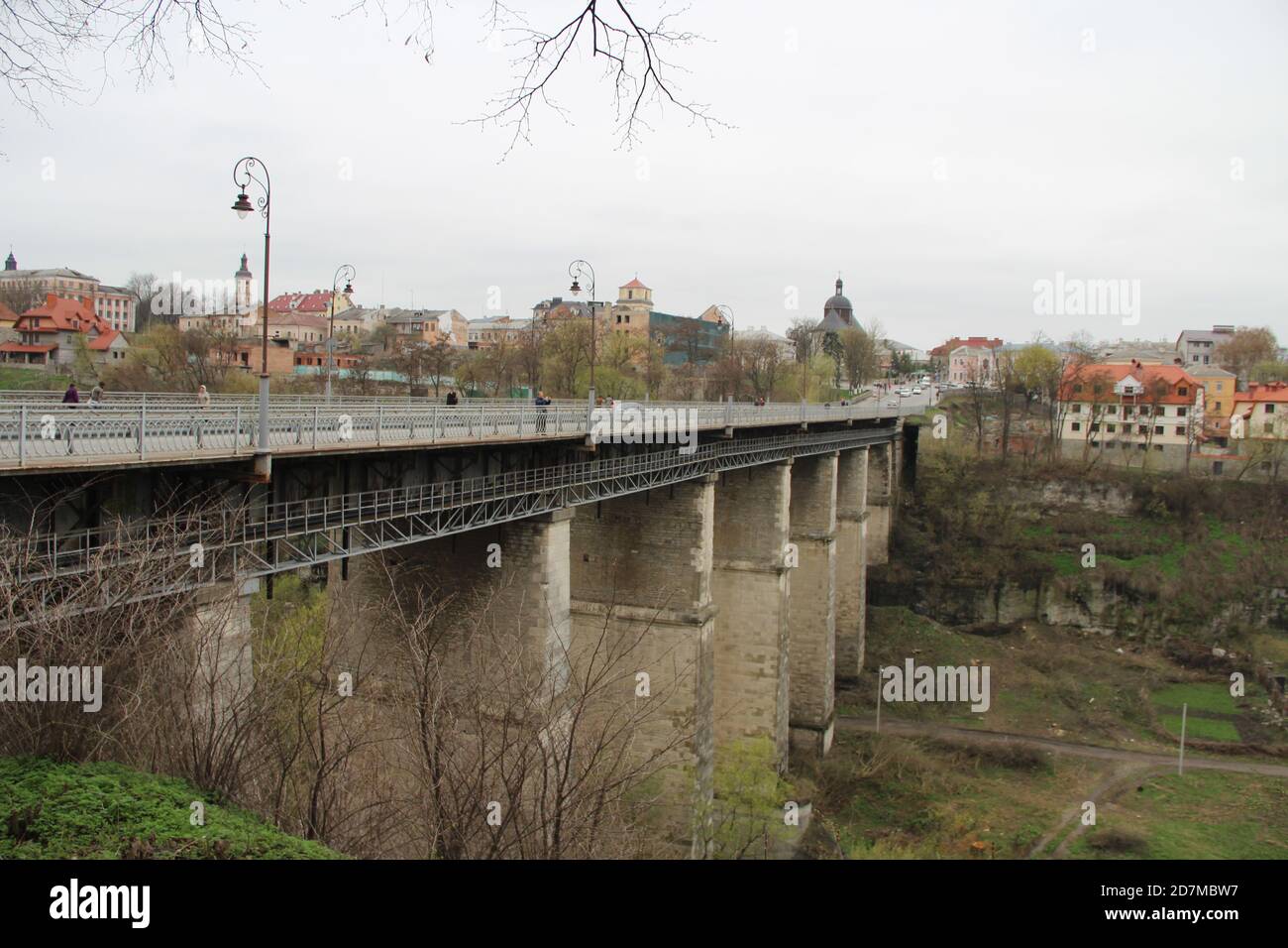 old stone bridge is over the river Stock Photo - Alamy