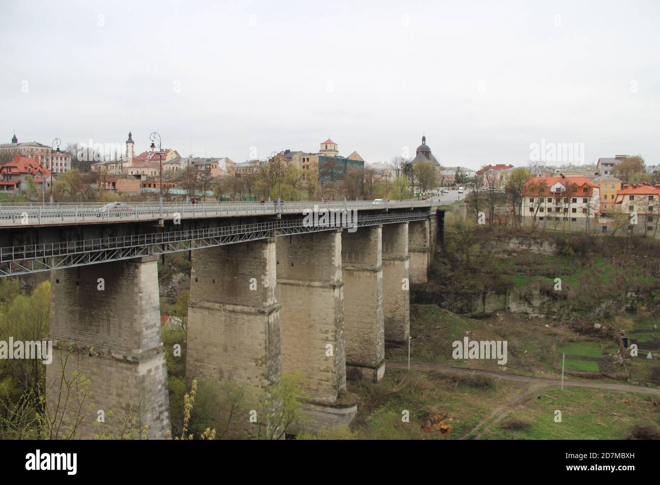 old stone bridge is over the river Stock Photo - Alamy