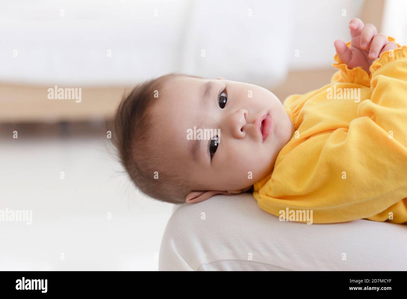 Boy lying on mothers lap hi-res stock photography and images - Alamy