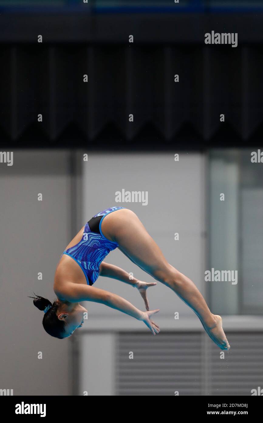 Tokyo, Japan. 24th Oct, 2020. Sayaka Mikami takes a dive off the 3m ...