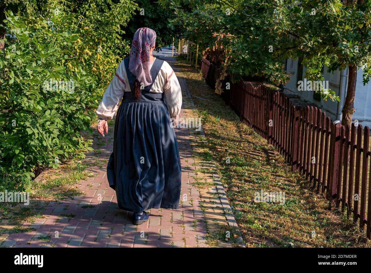 Woman white dress walks along hi-res stock photography and images - Alamy