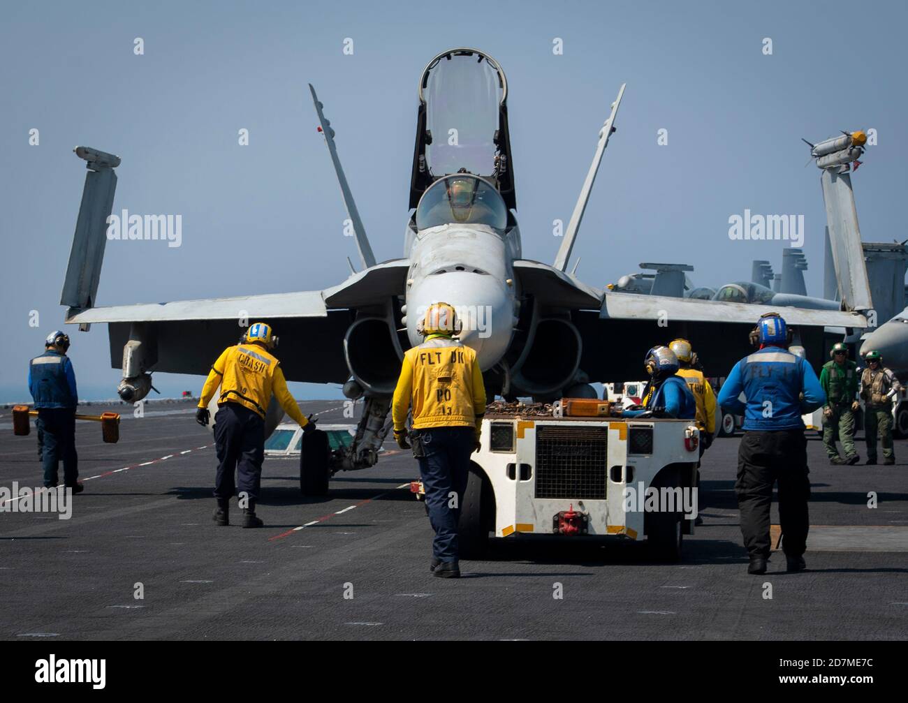 200922-N-ZR324-0009 ARABIAN GULF (Sept. 22, 2020) Sailors taxi an F/A ...
