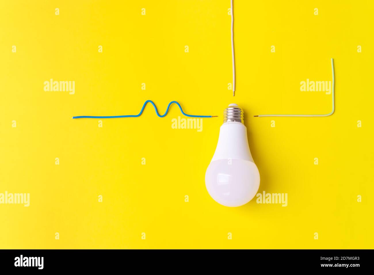 White light bulb Against Yellow Background with wires phase, zero ...