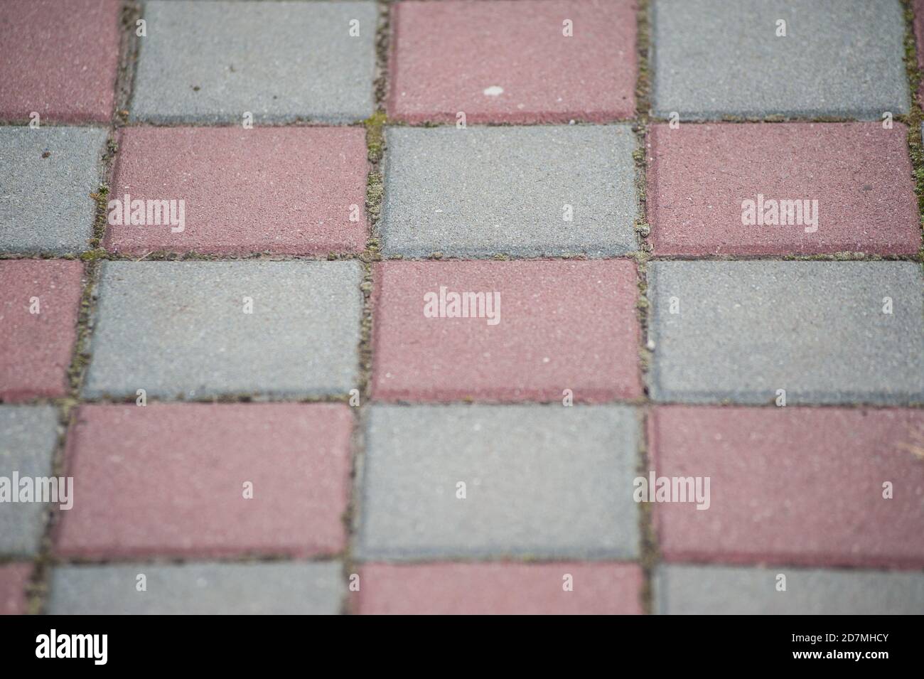 The pink grey paving tiles texture or background Stock Photo - Alamy