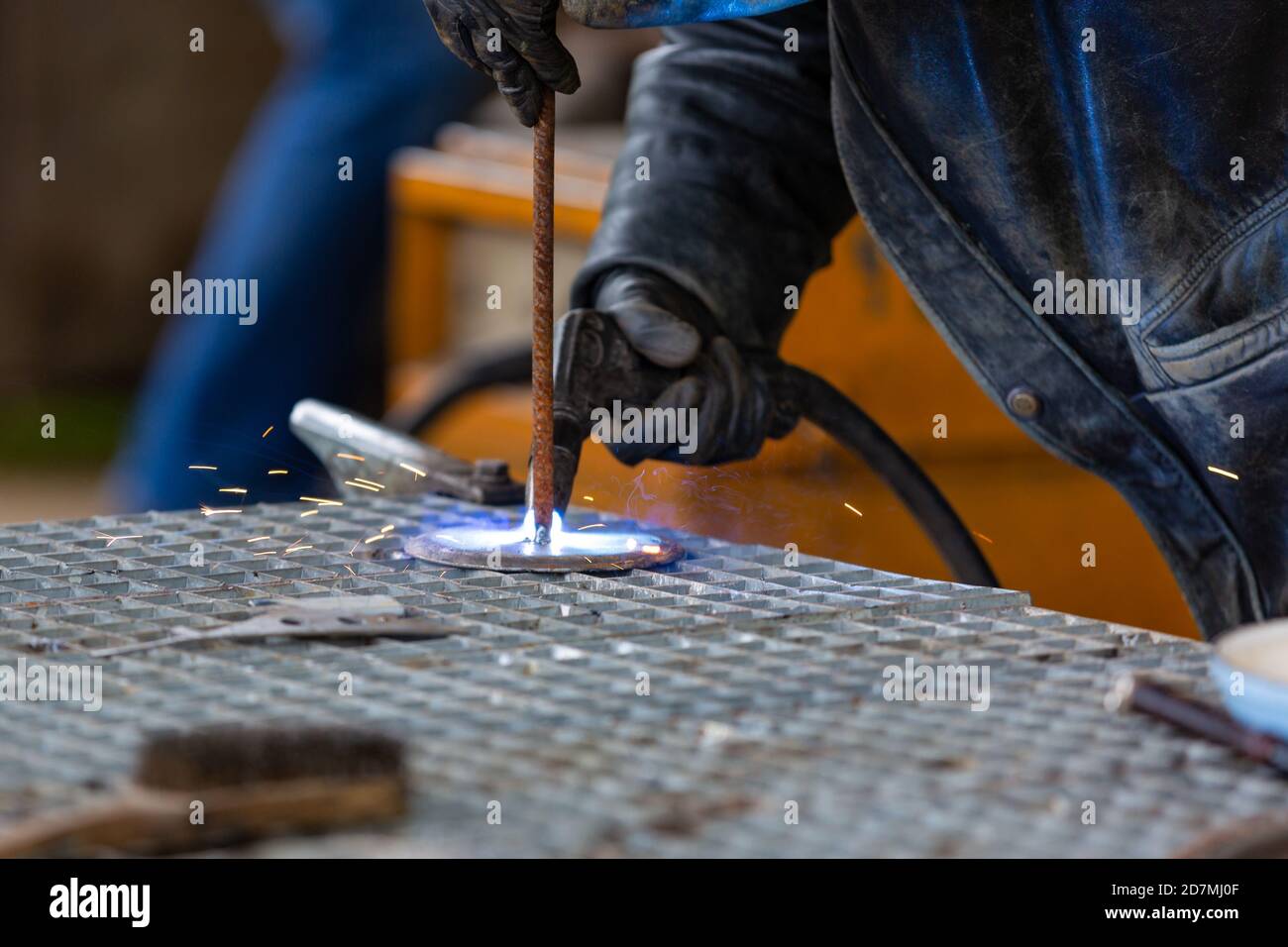 Details of welding activities - a welder is welding steel compon Stock ...