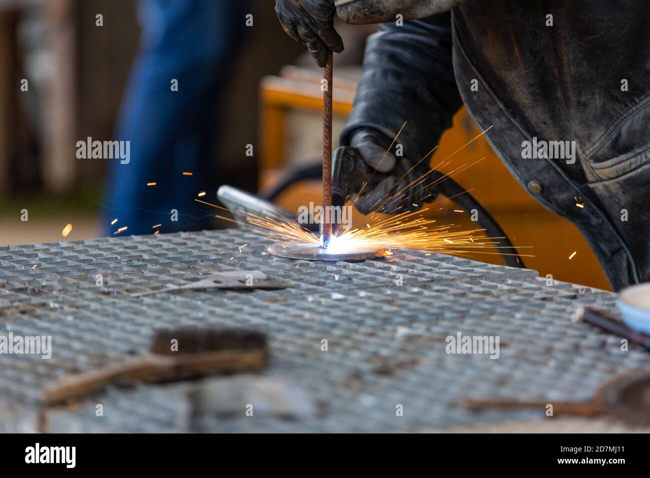 Details of welding activities - a welder is welding steel compon Stock ...