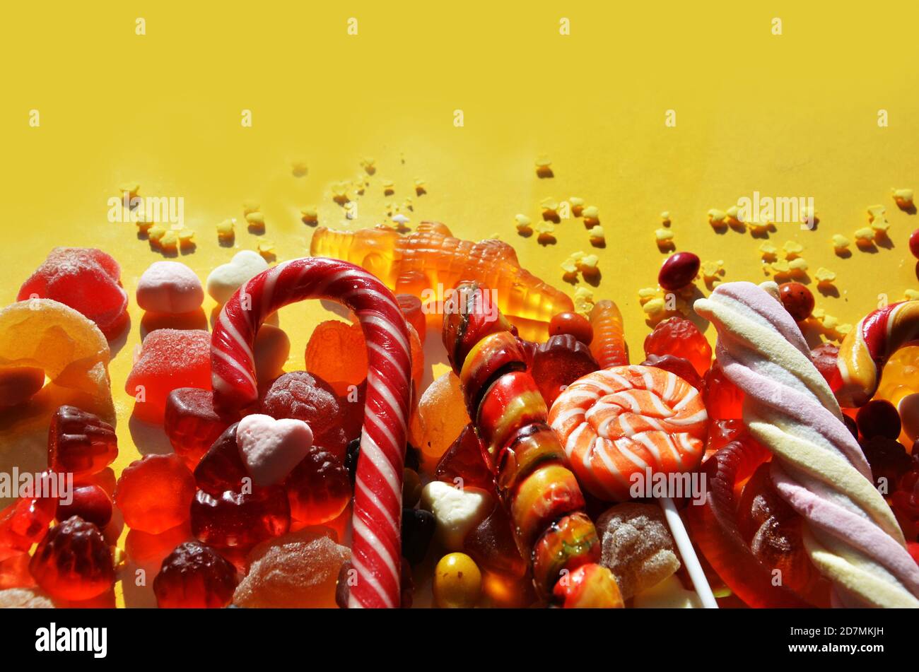 candies with jelly and sugar. colorful array of different childs sweets ...