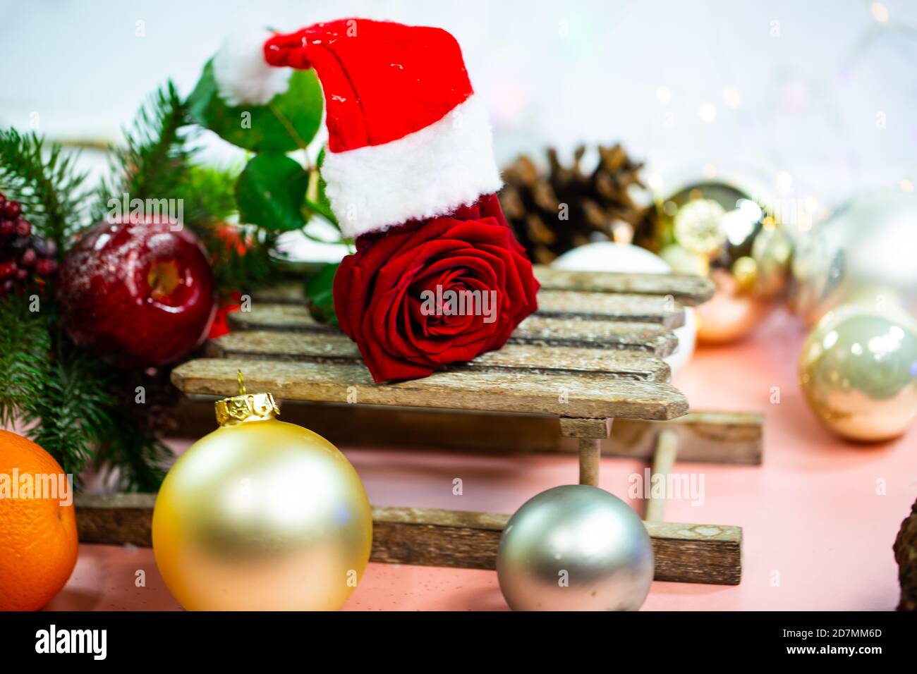 red rose with santa hat, christmas card Stock Photo - Alamy
