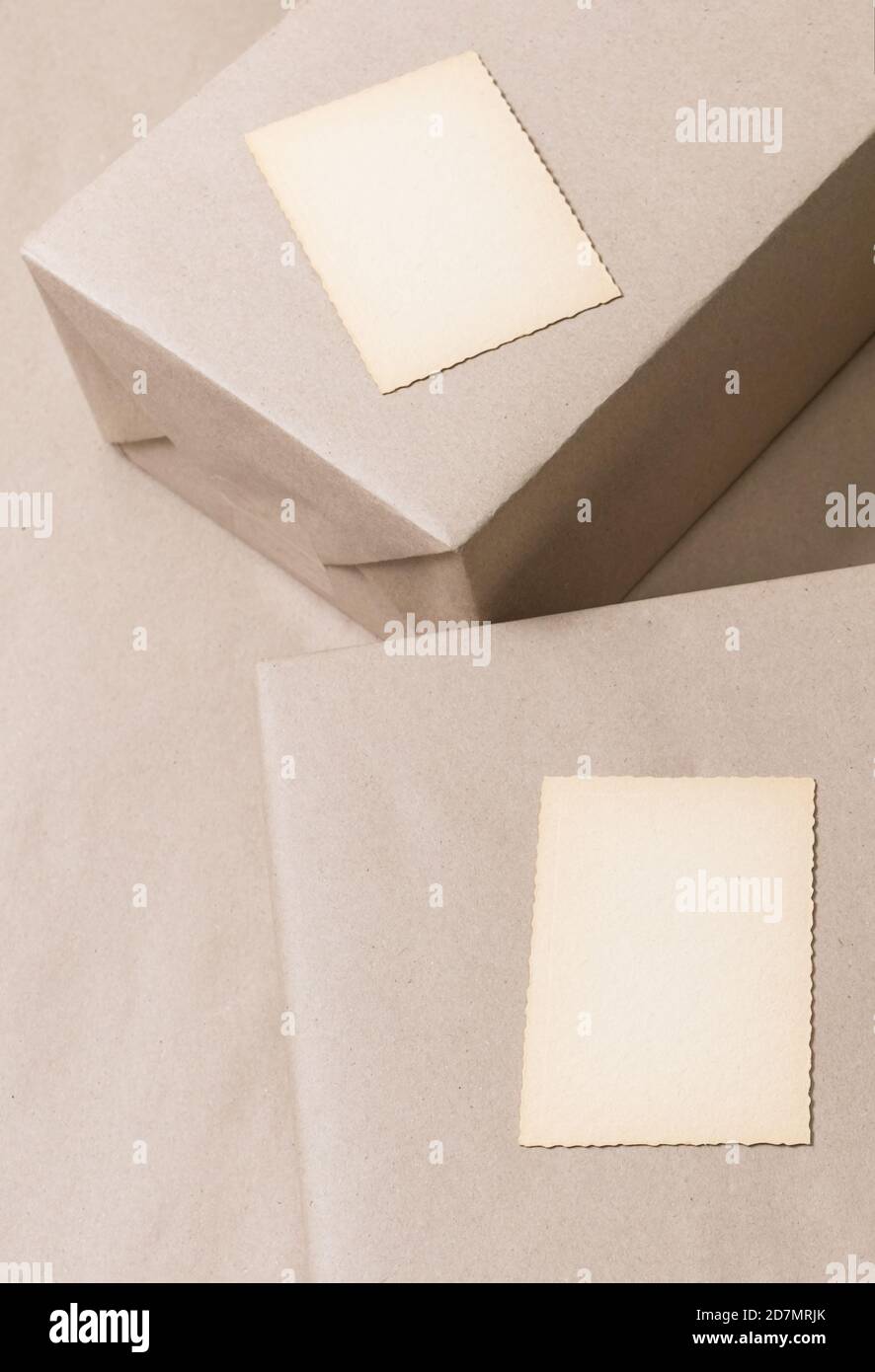 Packed Boxes on Grey background with Post Greeting Card, top view Stock ...