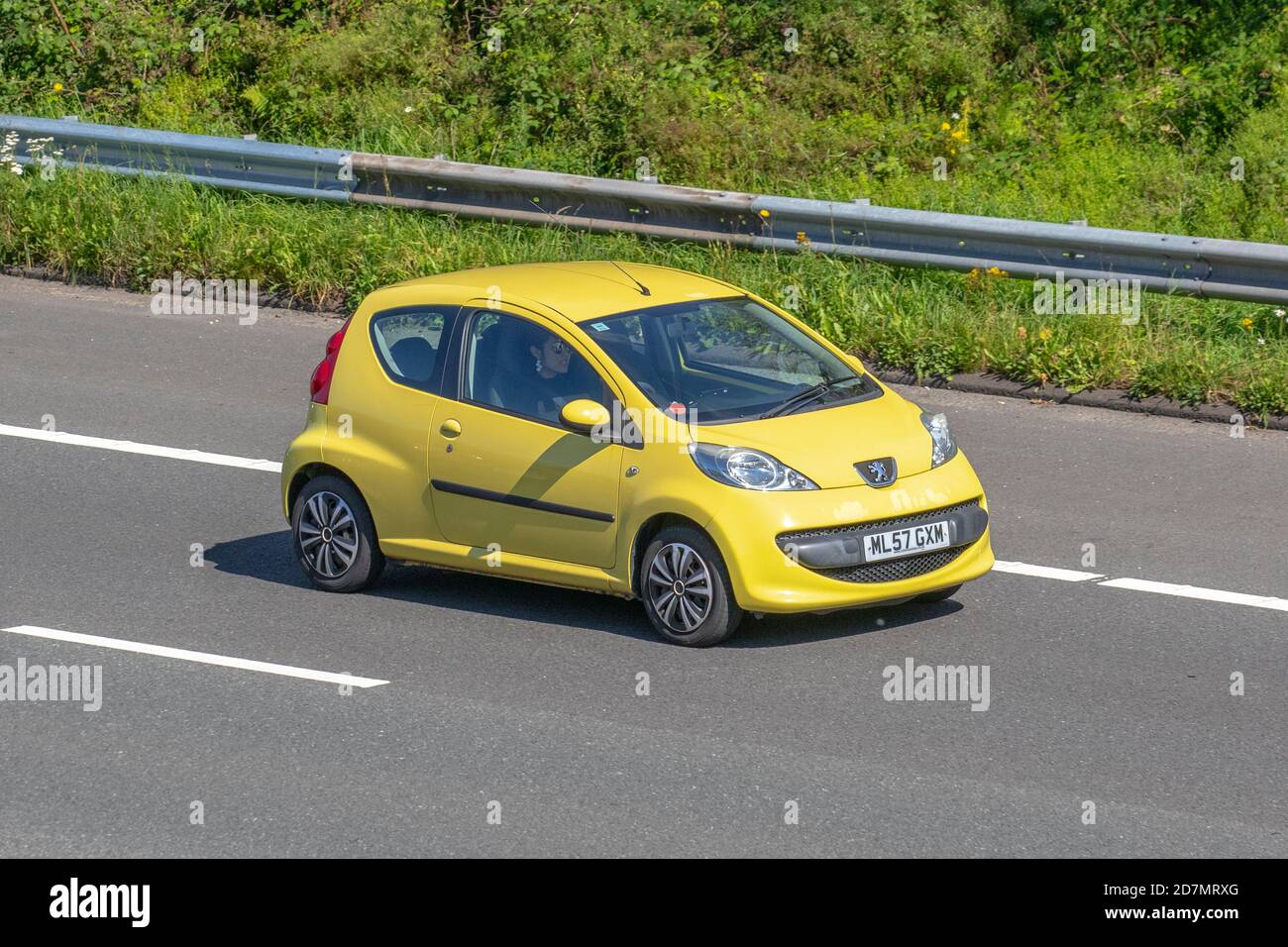 2007 yellow Peugeot 107 Urban; Vehicular traffic, moving vehicles, cars ...