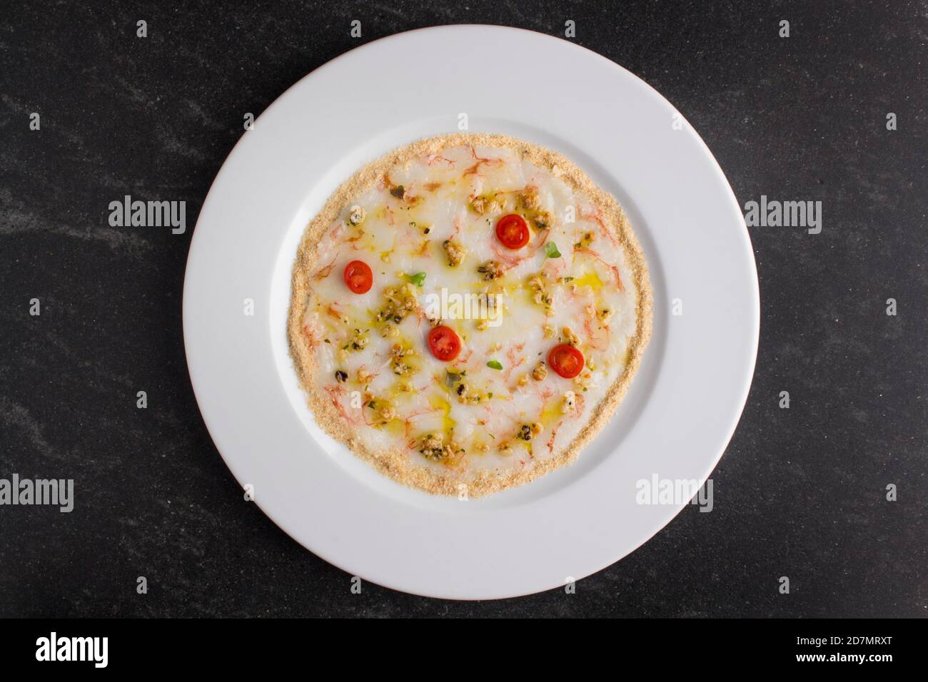 shrimp pizza with sea fruit sauce Stock Photo - Alamy