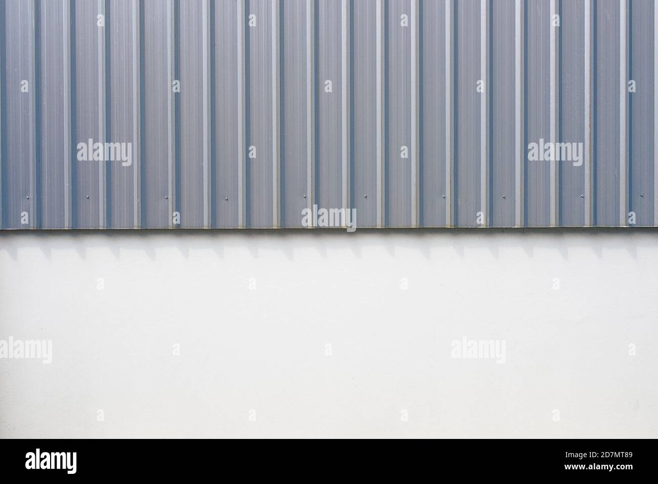 Corrugated metal panel cladding of a warehouse building Stock Photo - Alamy
