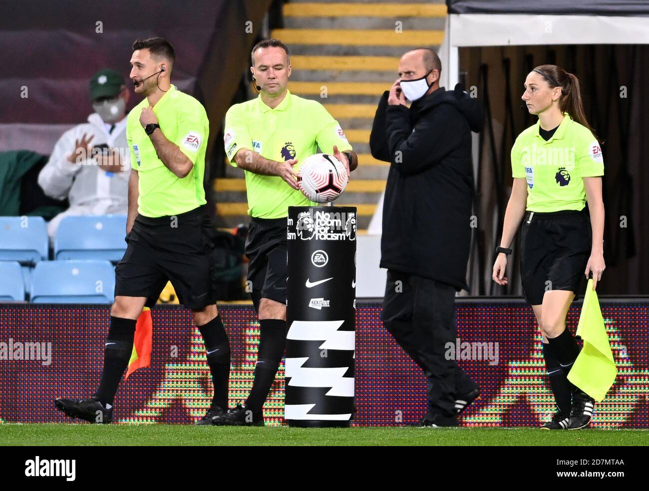 Referee Paul Tierney (centre) takes the ball off the plinth alongside ...