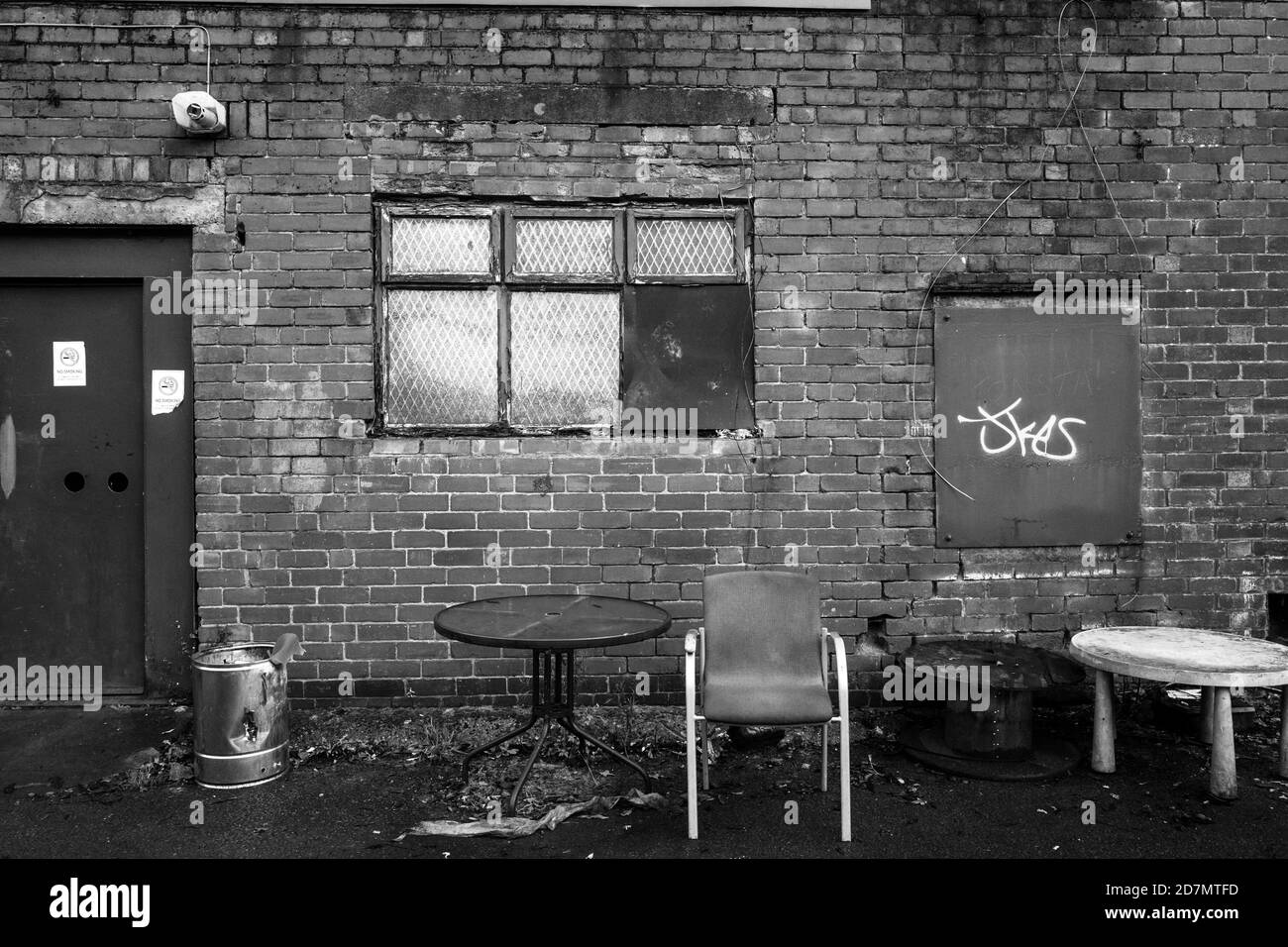 Old single storey brick built industrial building in decaying state ...