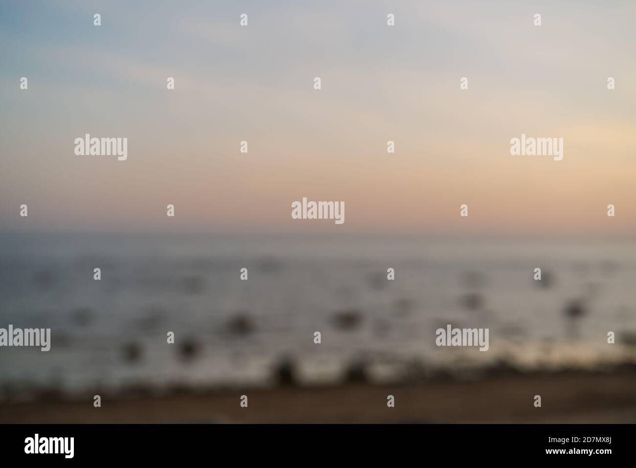 Blurred background of beach during sunset, backdrop Stock Photo - Alamy