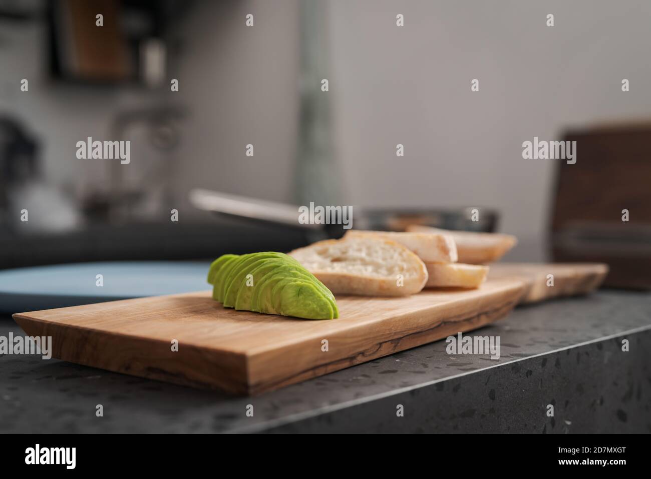 ingredients for breakfast sandiches with avocado on kitchen countertop ...