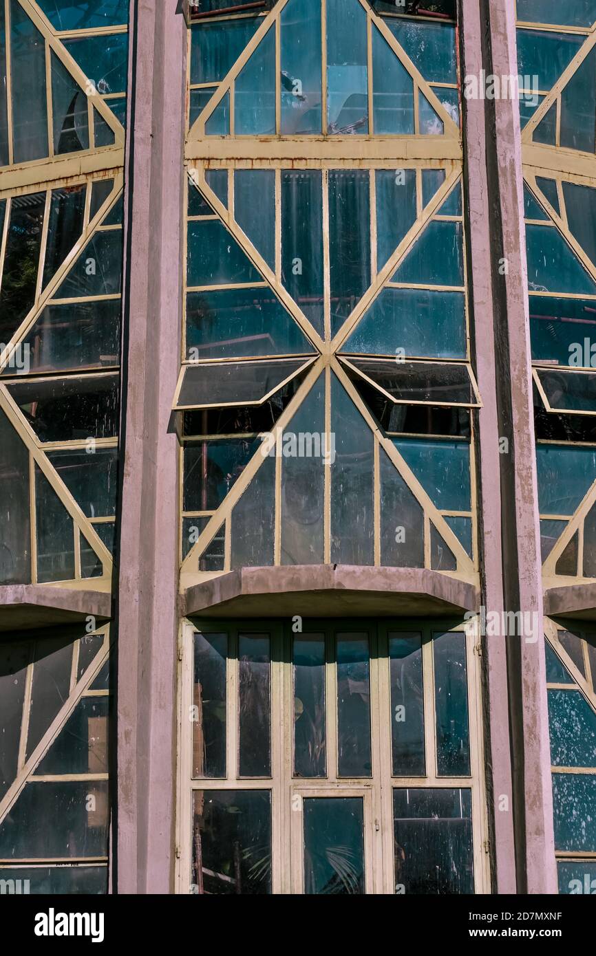 Vertical shot of a modern building with glass windows Stock Photo - Alamy