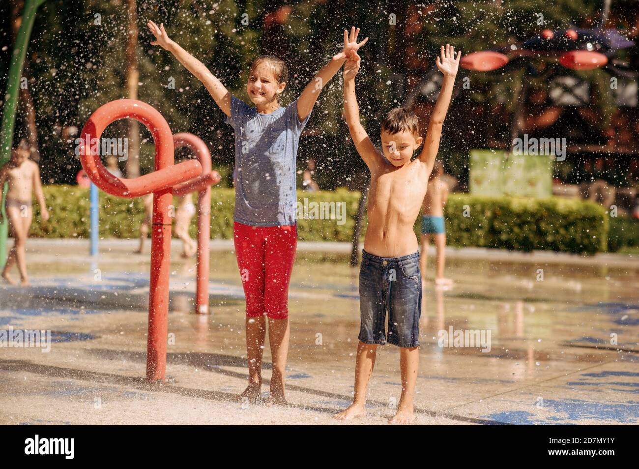 Baby water play sprinkler hi-res stock photography and images - Alamy