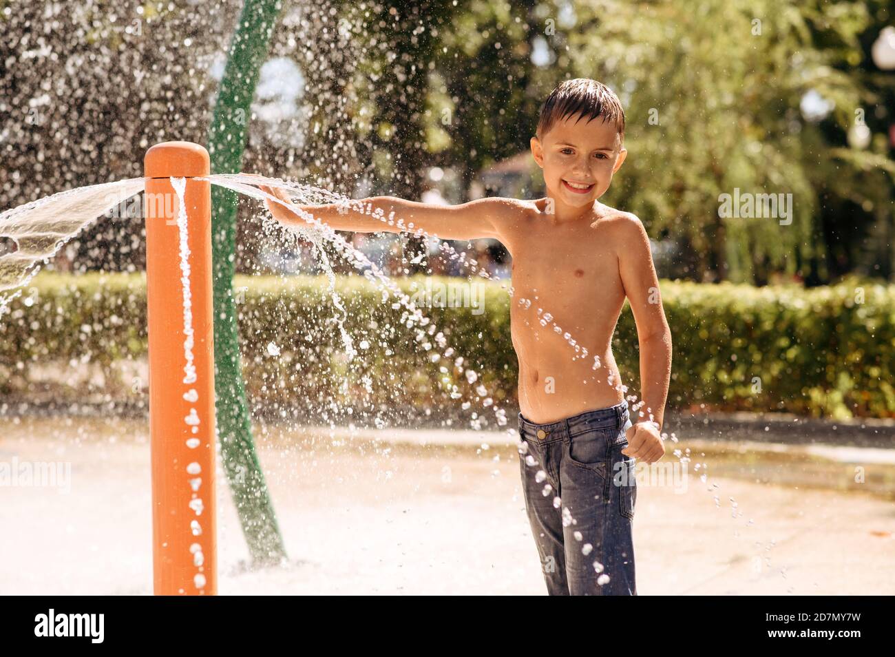 Baby Water Play Sprinkler High Resolution Stock Photography and Images ...