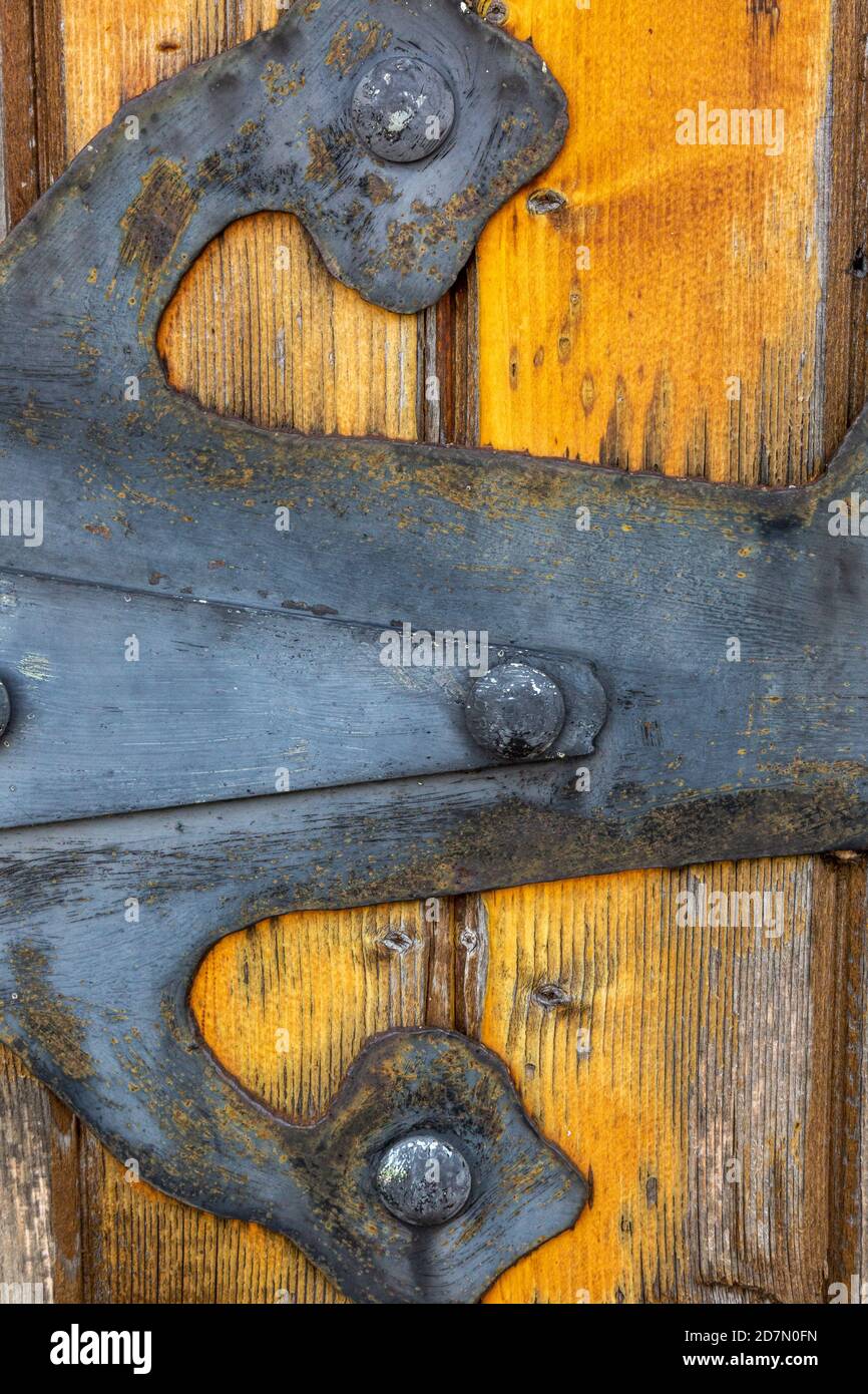 A close-up of the door wing portion of a strap hinge Stock Photo - Alamy