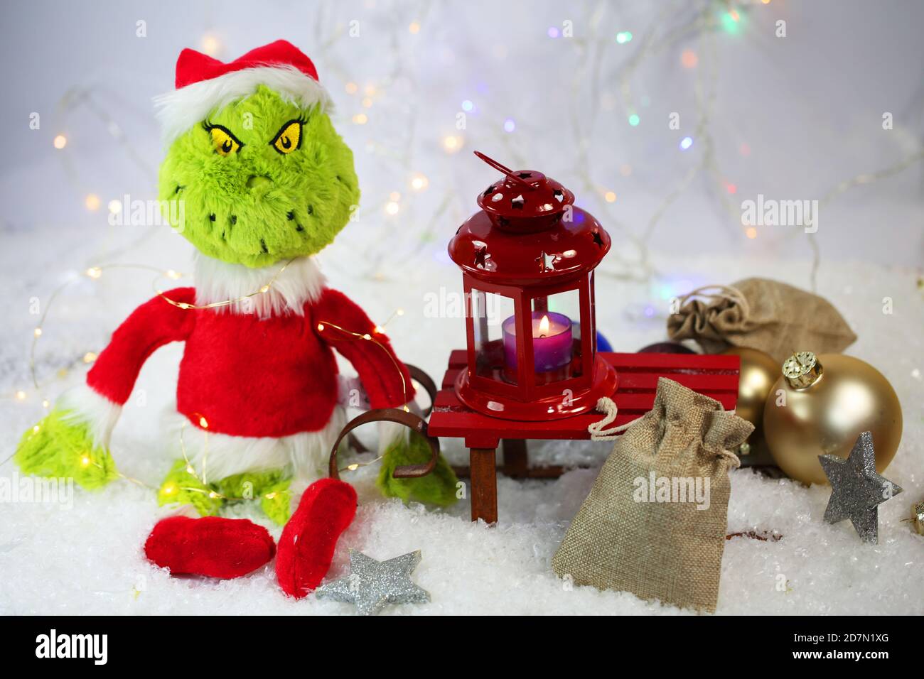 Grinch with gift Stock Photo - Alamy