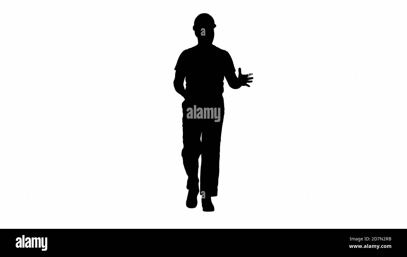 Silhouette Foreman builder explaining something to camera and ta Stock ... Silhouette Foreman builder explaining something to camera and ta Stock ...