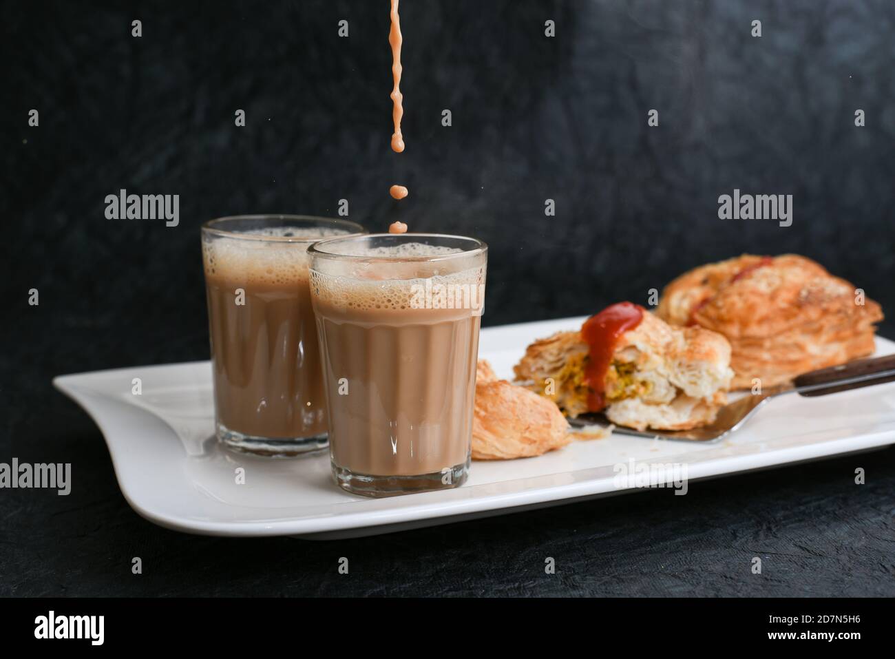 Top view of Indian Masala Chai or traditional beverage with tea, milk ...