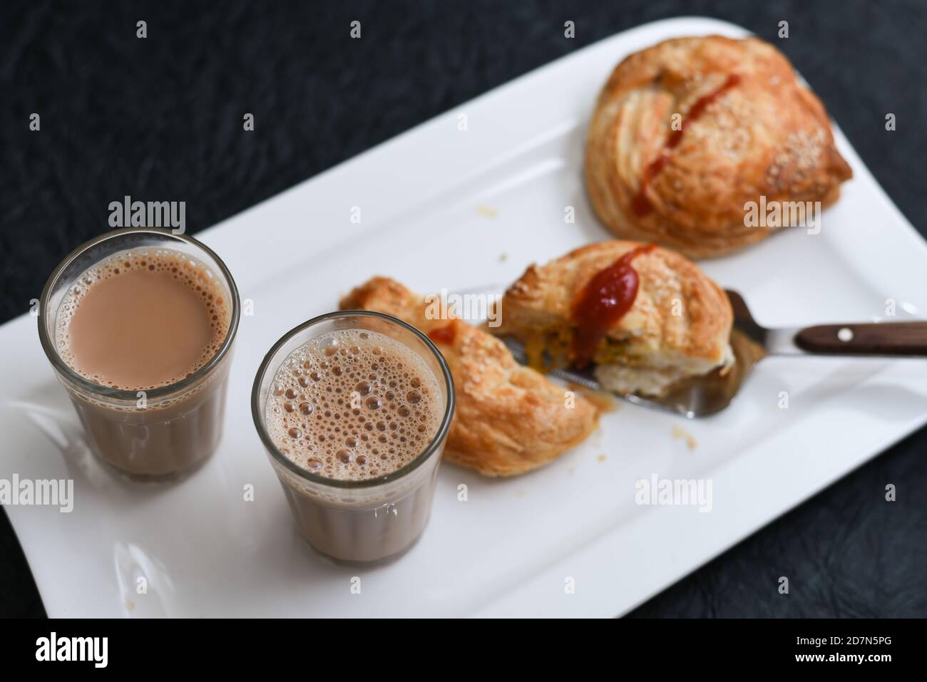 Top view of Indian Masala Chai or traditional beverage with tea, milk ...