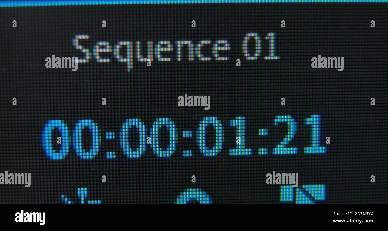 Time countdown in blue digits occurs in timecode while film maker works ...