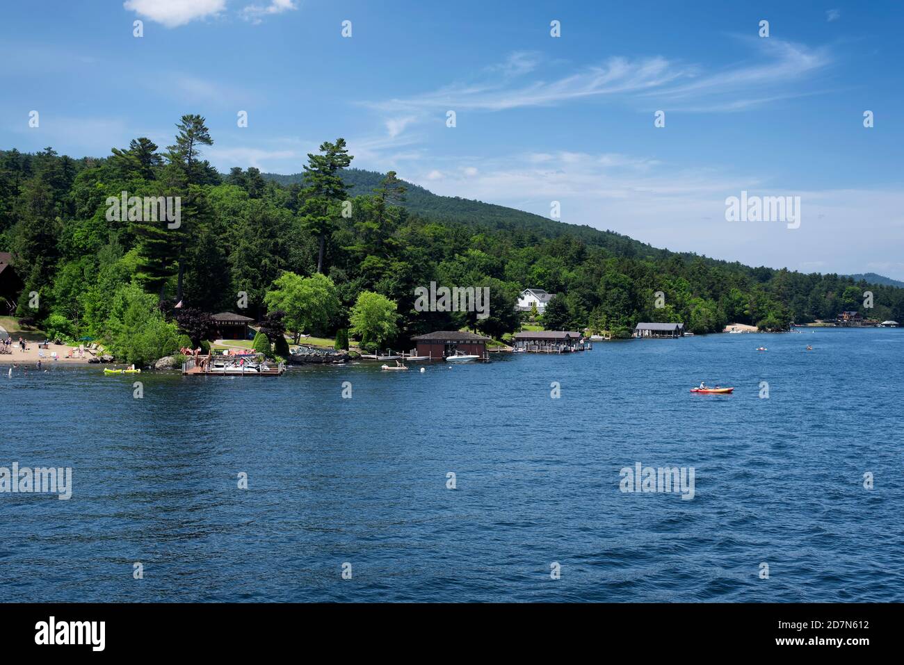 Lake George, New York. July 19, 2019. Tourists active on the shores of ...