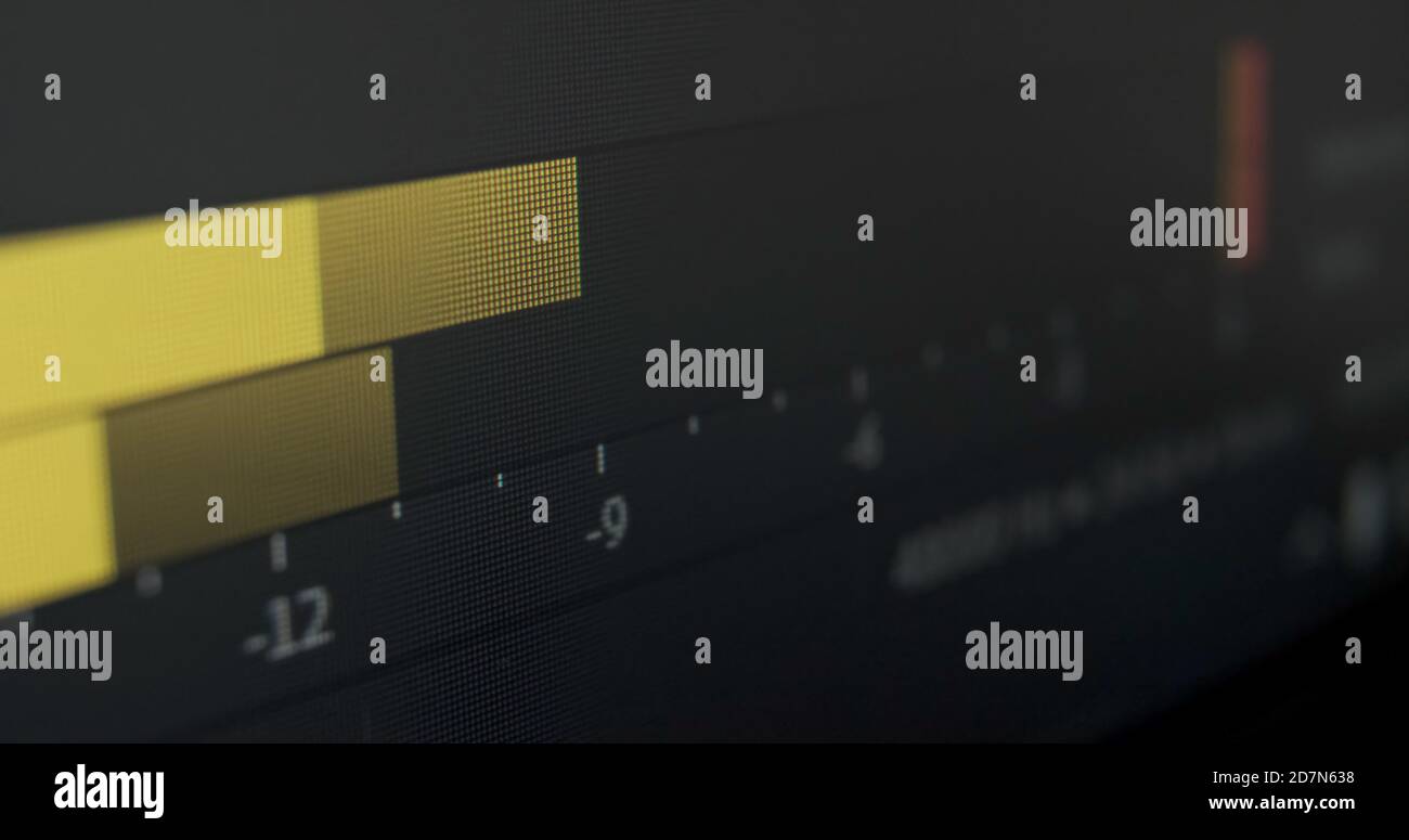 yellow and red digital indicator bars on audio control panels show ...