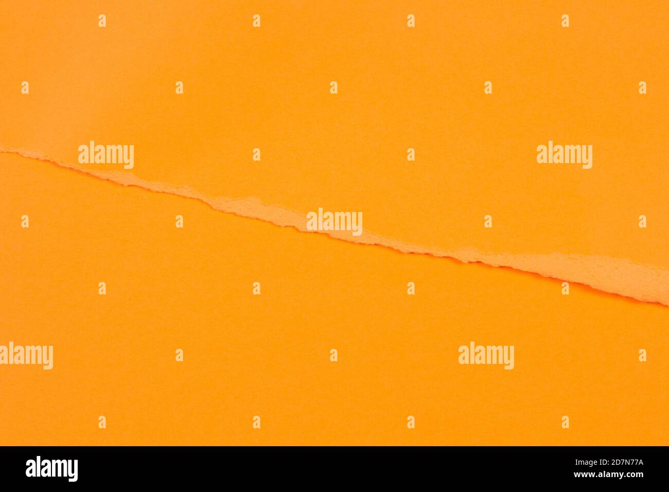 Orange torn ripped paper background texture Stock Photo - Alamy