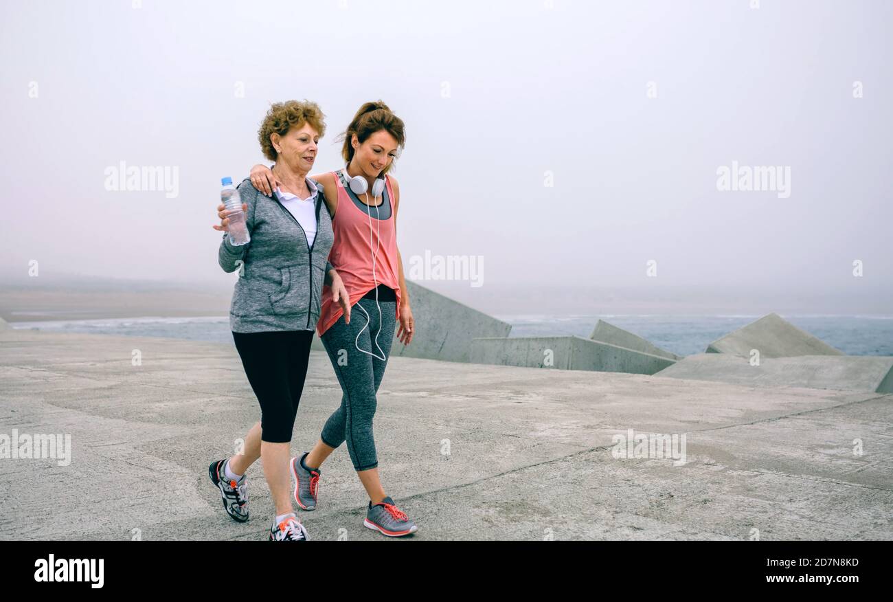 Two women walk exercise hi-res stock photography and images - Alamy