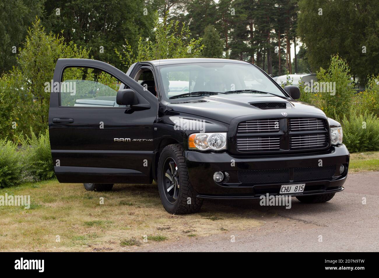 Four-wheel drive, 4x4. Front view of the open door Stock Photo - Alamy