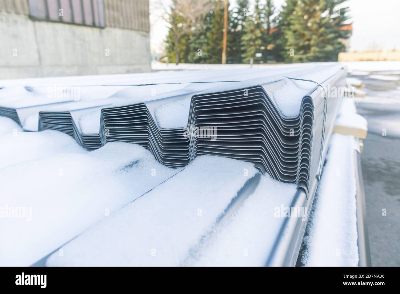 stack of corrugated metal roofing outside in winter Stock Photo - Alamy