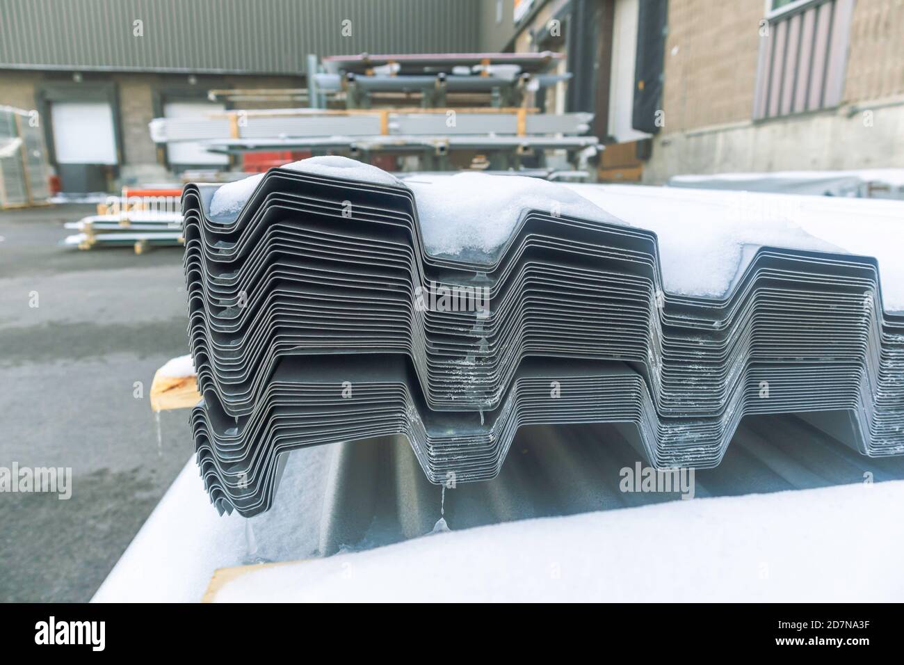 stack of corrugated metal roofing outside in winter Stock Photo - Alamy