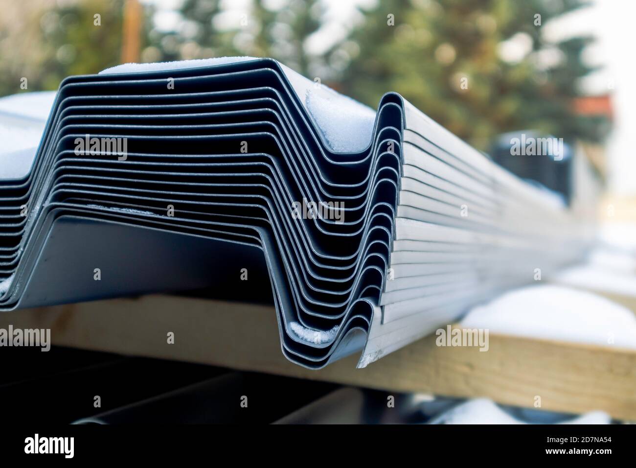 stack of corrugated metal roofing outside in winter Stock Photo - Alamy