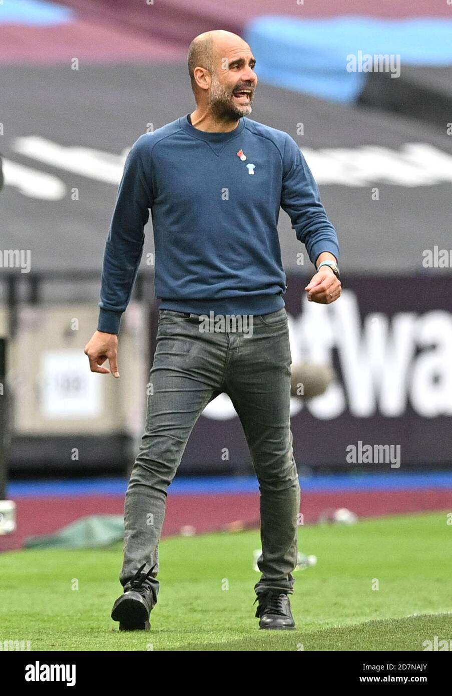 Manchester City manager Pep Guardiola gestures on the touchline during ...