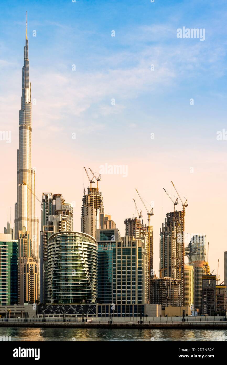 Stunning view of the Dubai skyline at sunset with the magnificent Burj ...