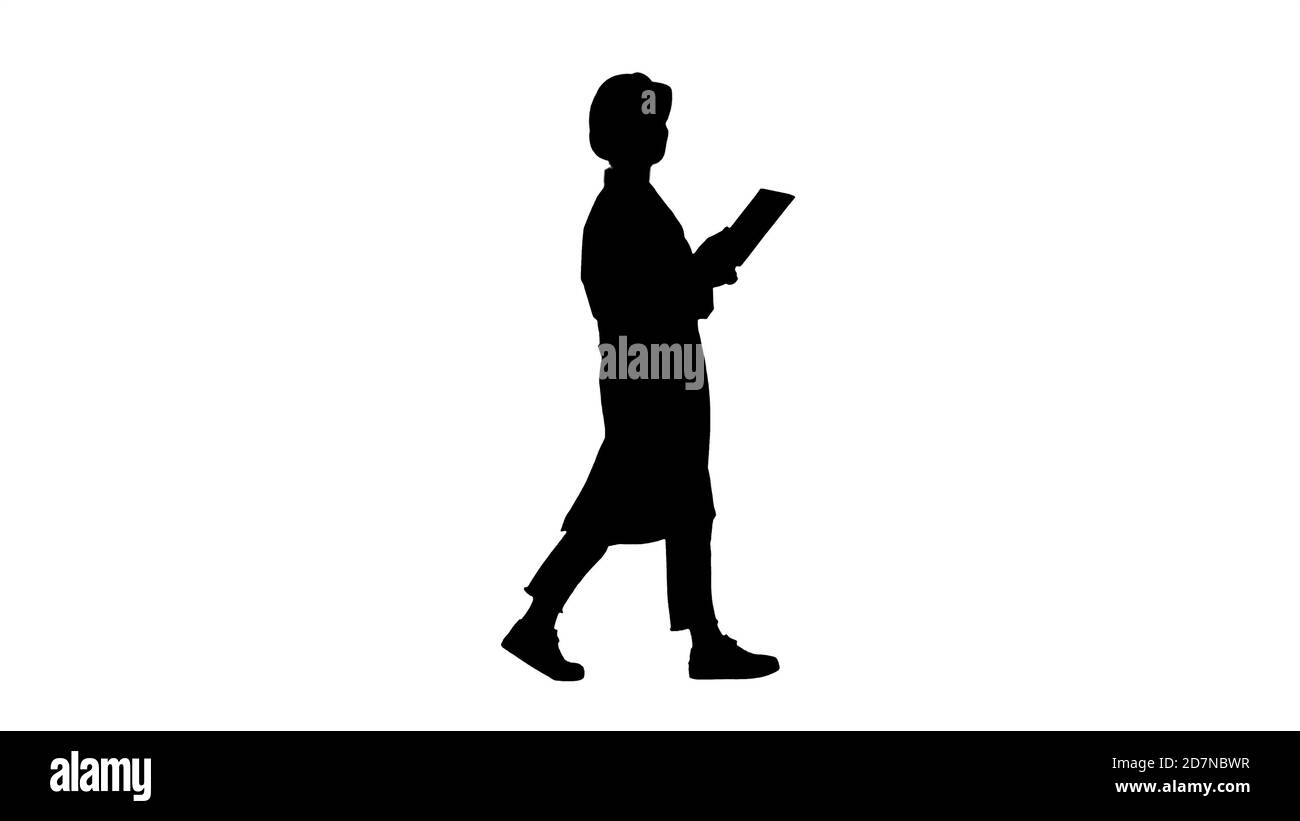 Silhouette Young technician inspecting and taking necessary note Stock ...