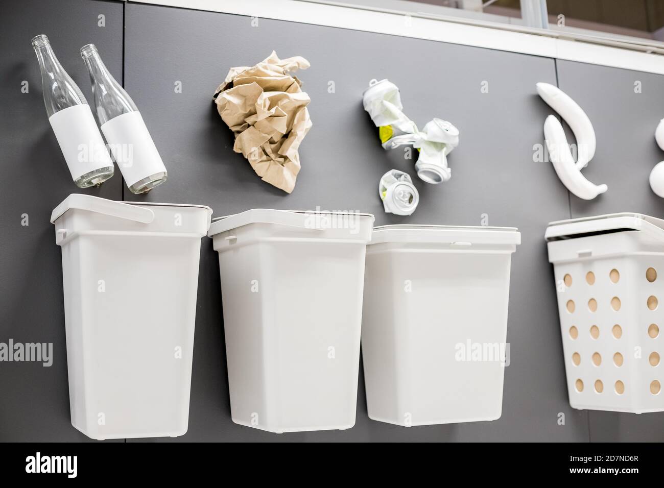 white Garbage cans for sorting garbage.Four decorative trash bins for ...