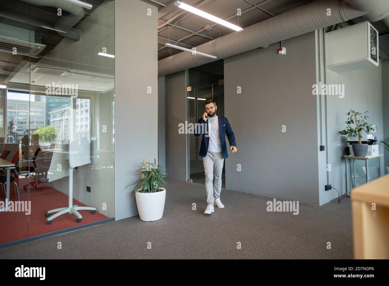 Man entering office hi-res stock photography and images - Alamy