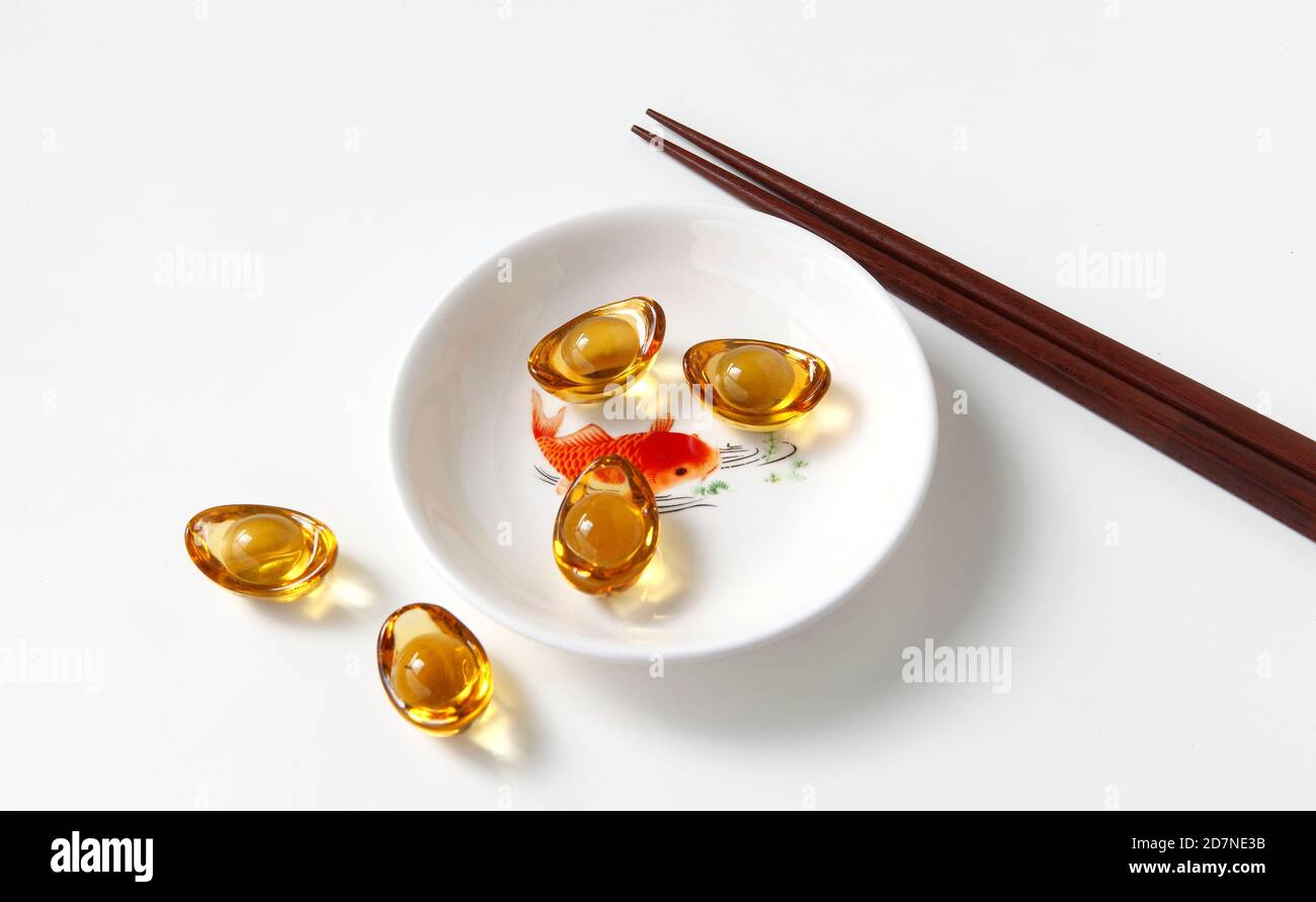 gorgeous ingot-shaped amulet Stock Photo - Alamy