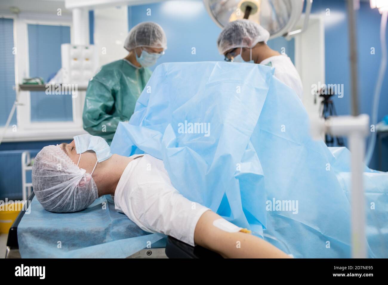Patient lying on an operating table hi-res stock photography and images ...