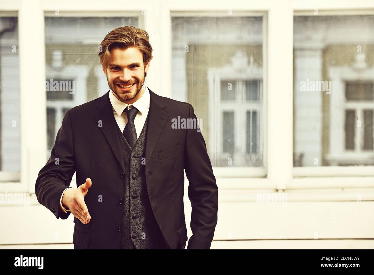 man offer cooperation or businessman with beard on happy face in black ...