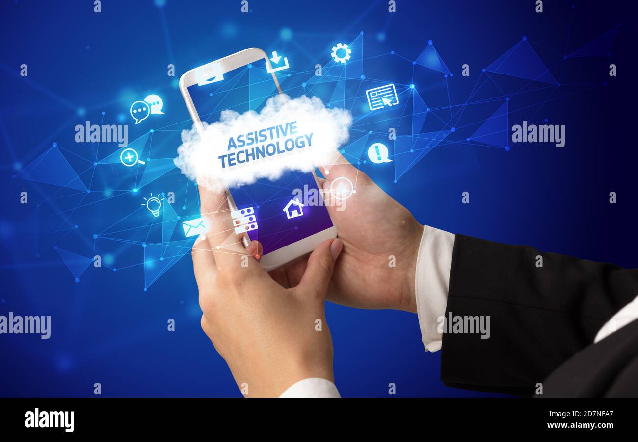 Female hand holding smartphone with ASSISTIVE TECHNOLOGY inscription ...