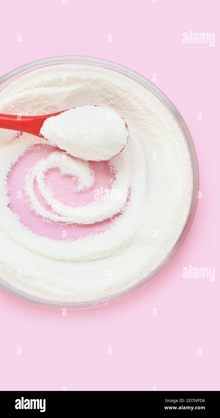 Collagen white powder. Pastel color background. Health product Stock ...
